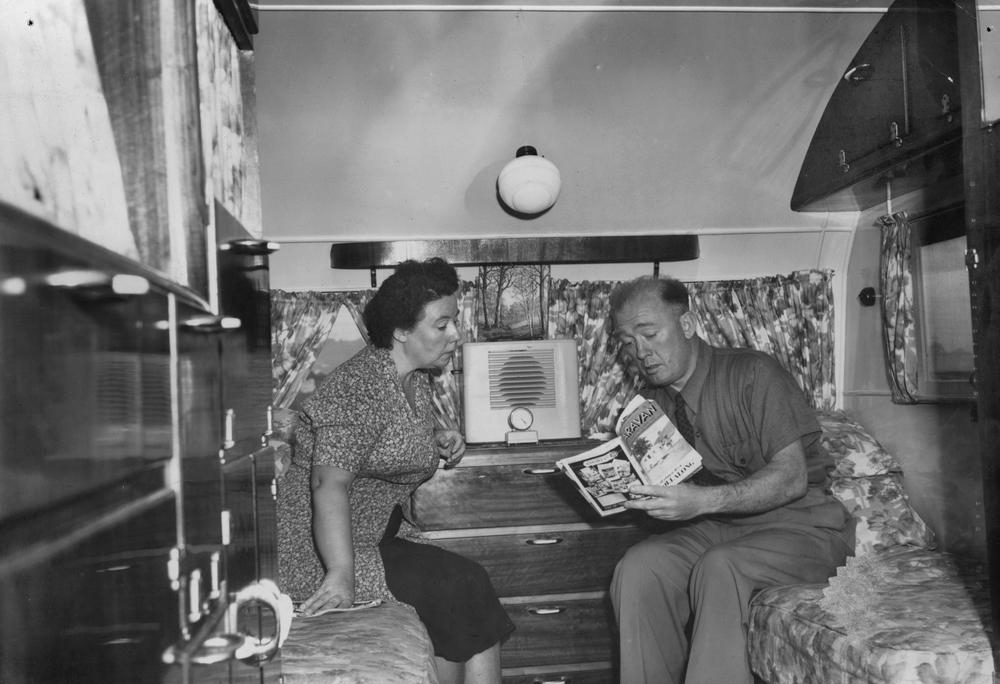 Reading a magazine, 1950 | Queensland Historical Atlas